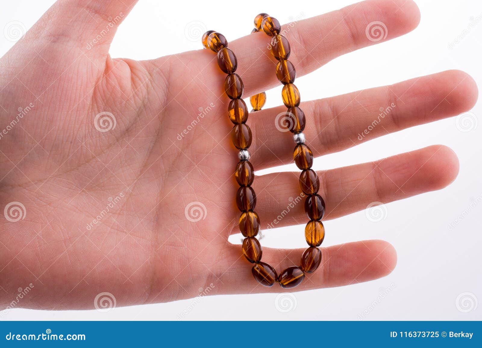 Hand holding a tespih stock image. Image of holy, colorful - 116373725