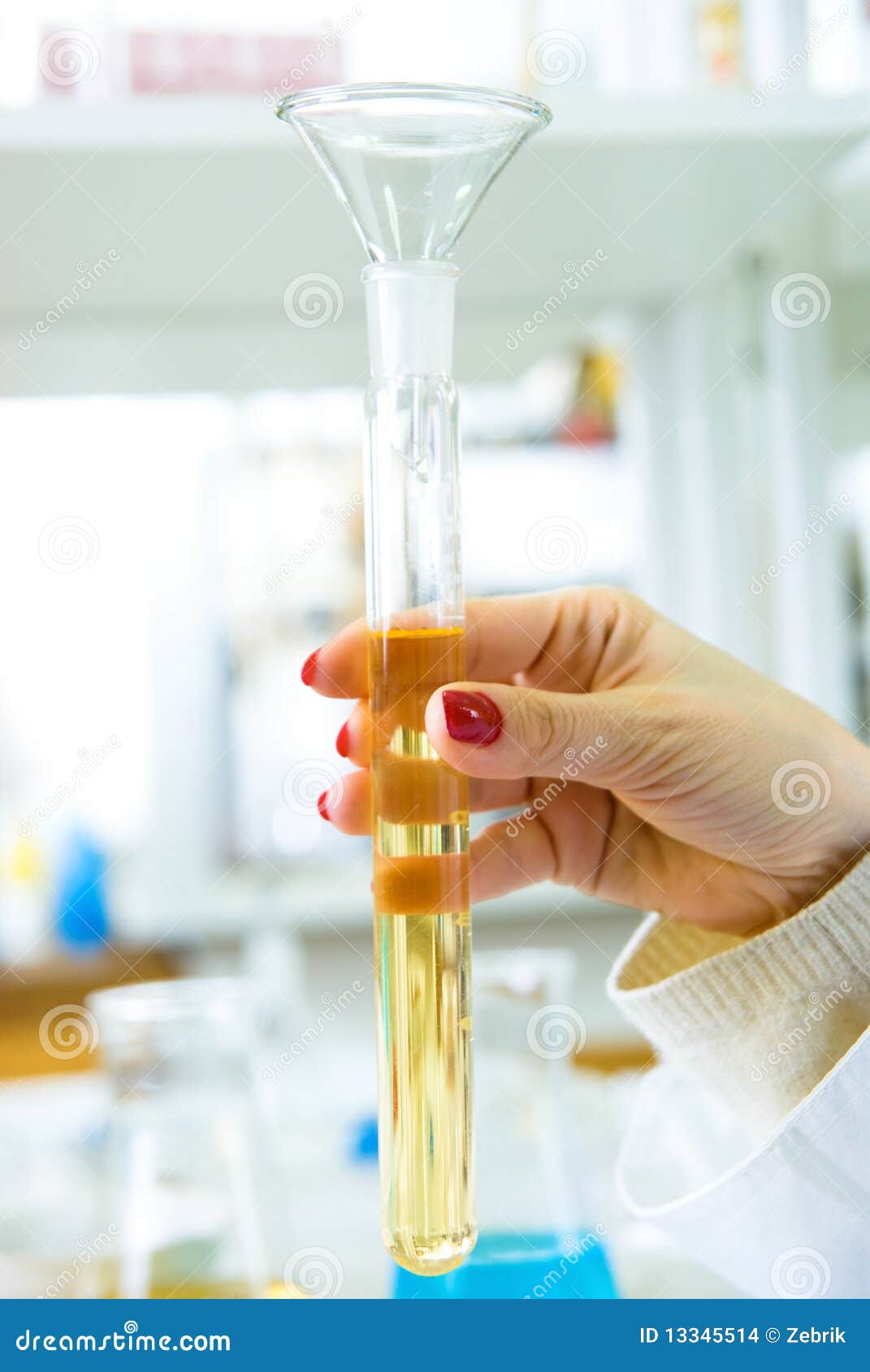 Hand holding a test tube stock photo. Image of material - 13345514