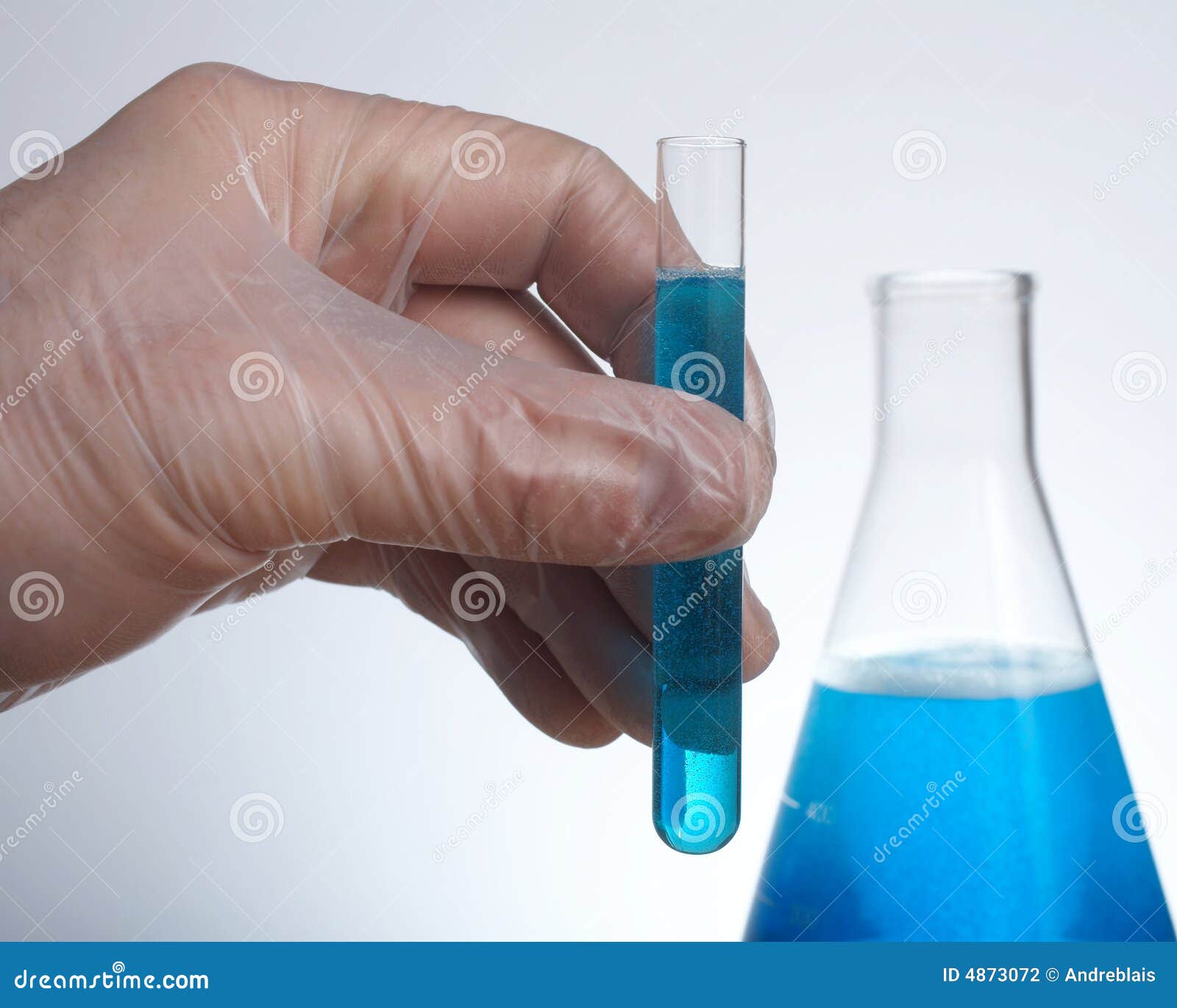 Hand Holding Test Tube stock photo. Image of experiment - 4873072