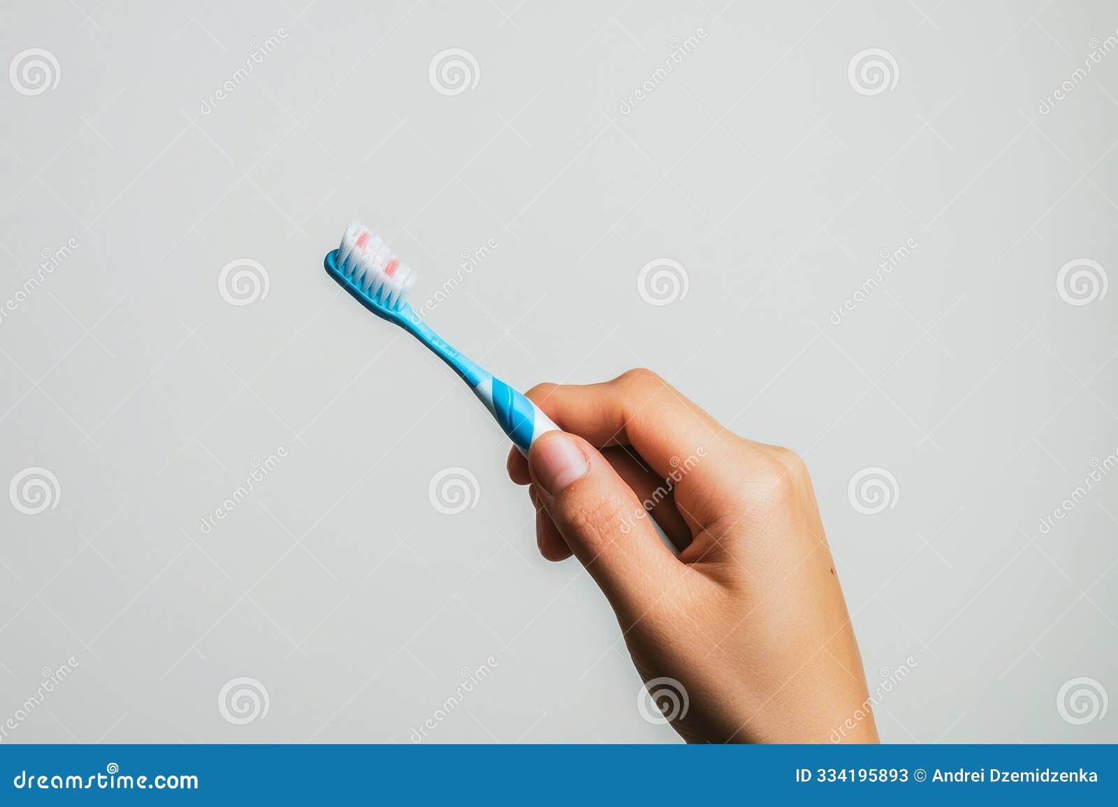 Hand Holding Toothpaste and Toothbrush on White Background Stock Image ...