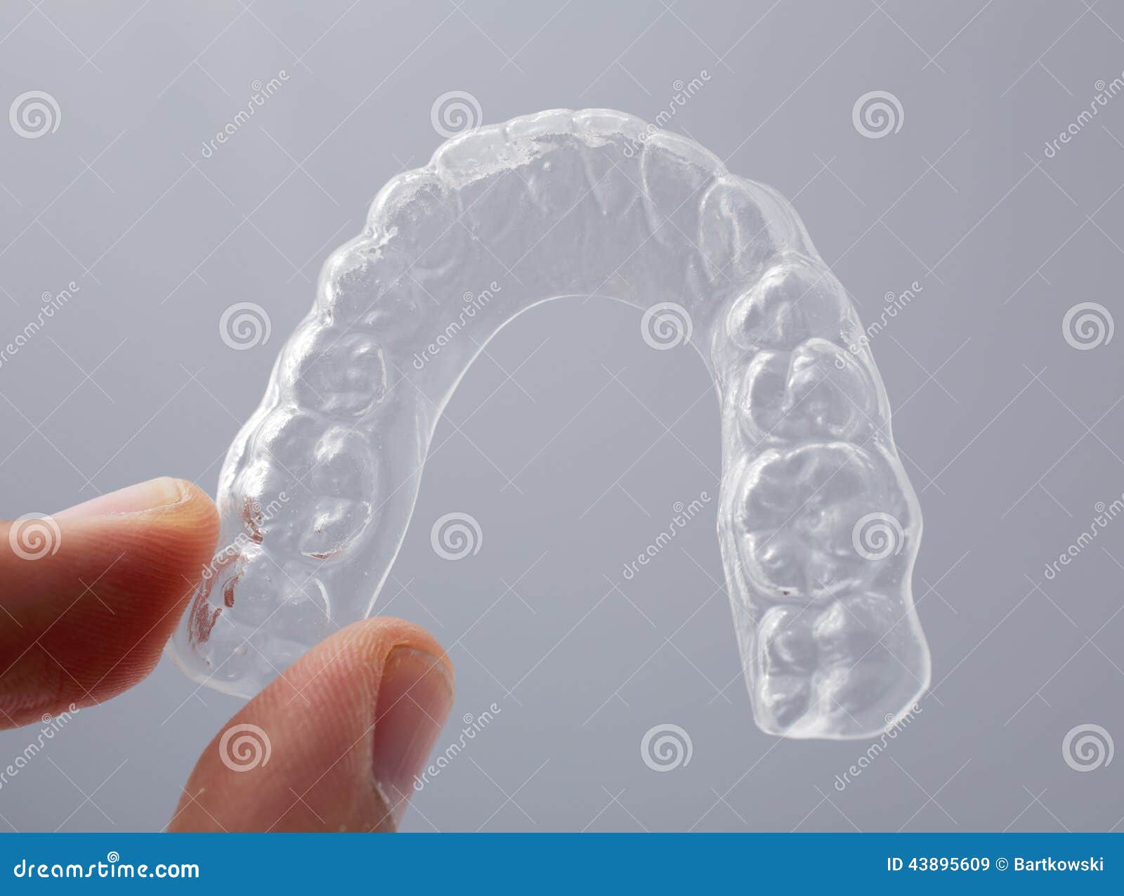 Hand Holding a Translucent Essix Retainer Stock Image - Image of ...