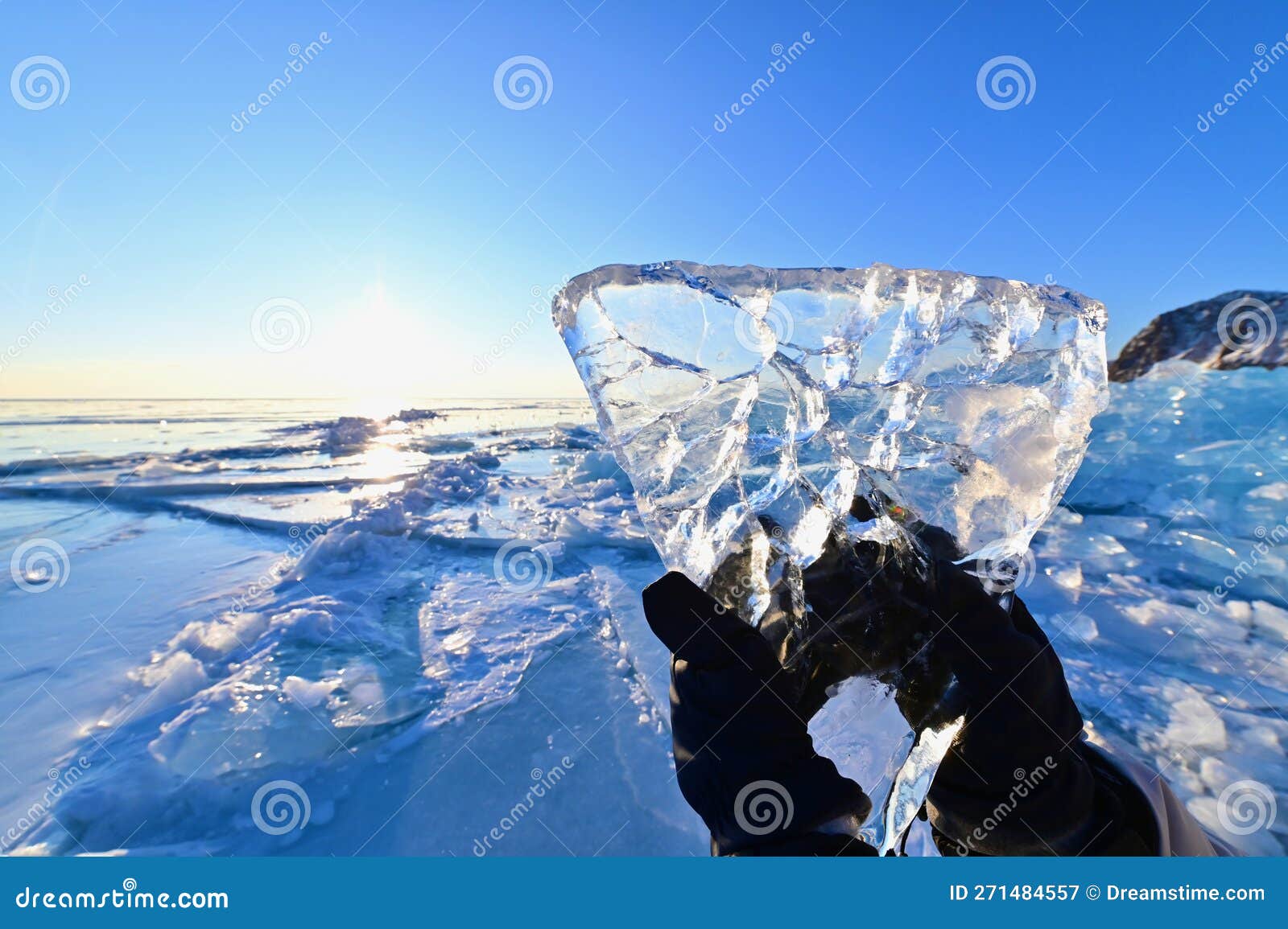 Hand Holding Triangular Ice Formation at Lake Baikal during Winter ...