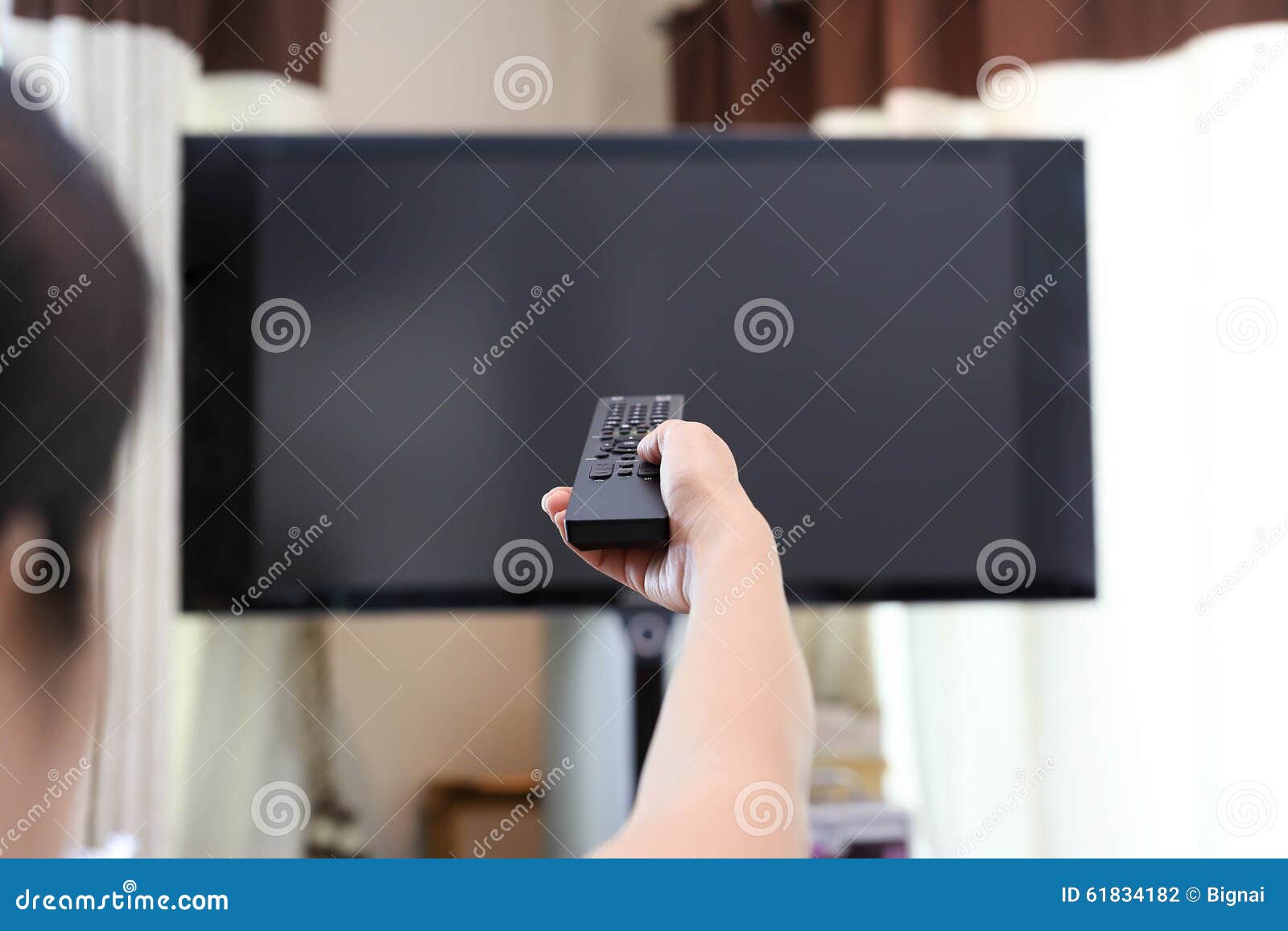 Hand Holding TV Remote Control Changing Television Channel Stock Photo ...