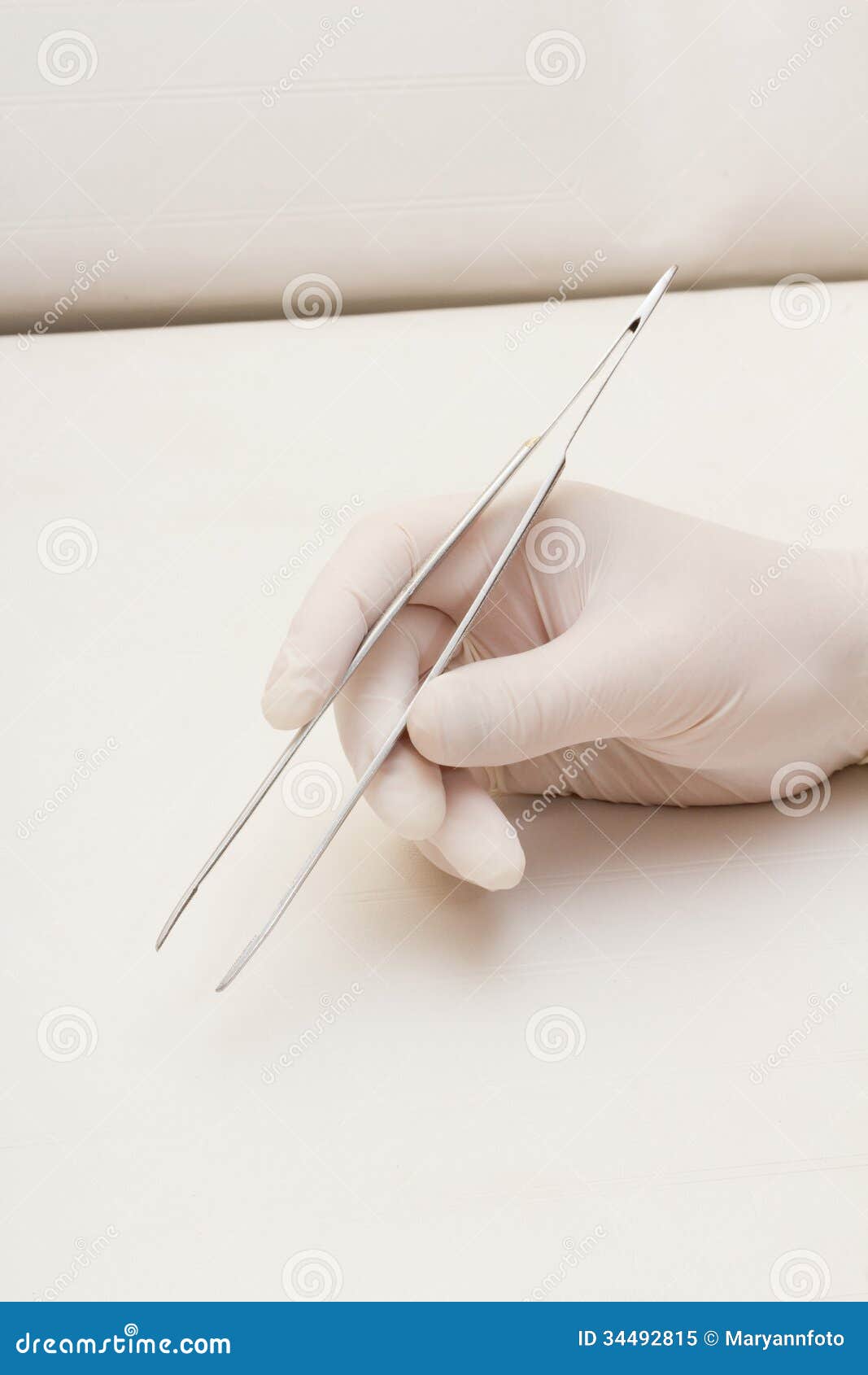 Hand holding tweezers stock image. Image of objectsequipment - 34492815