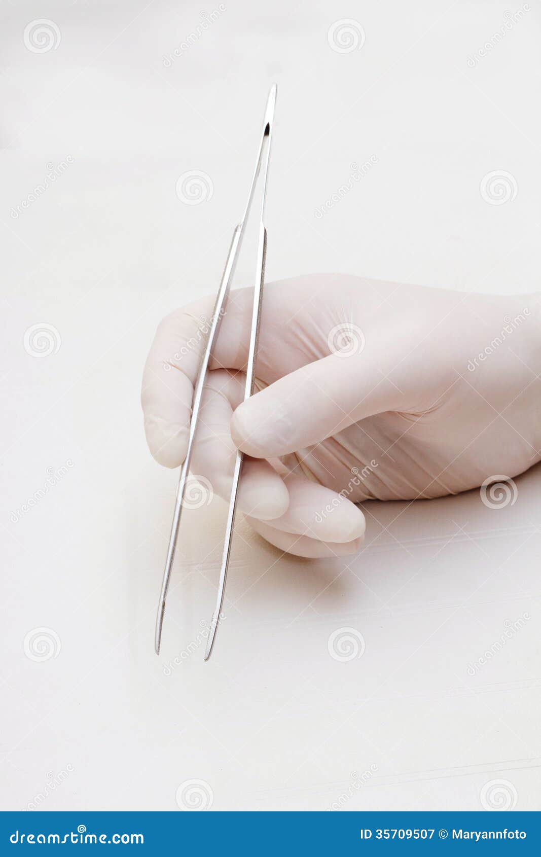 Hand holding tweezers stock image. Image of equipment - 35709507