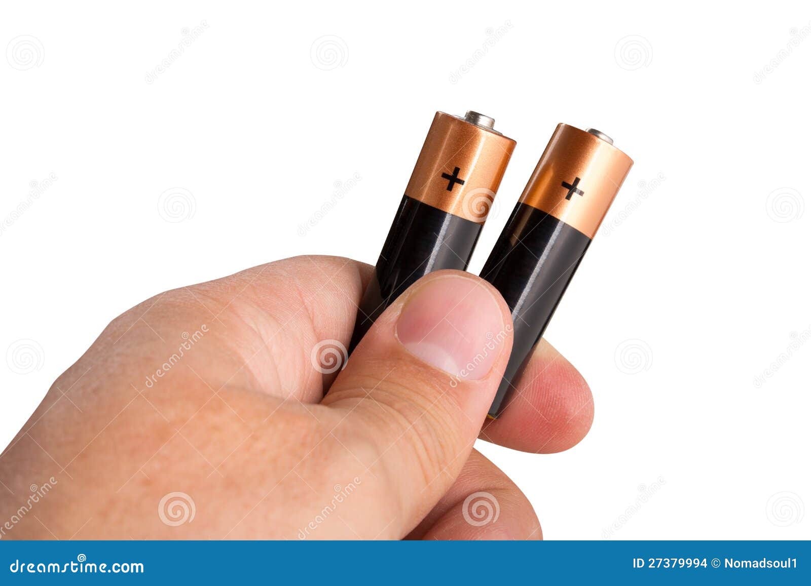 Hand holding two batteries stock photo. Image of electronics - 27379994