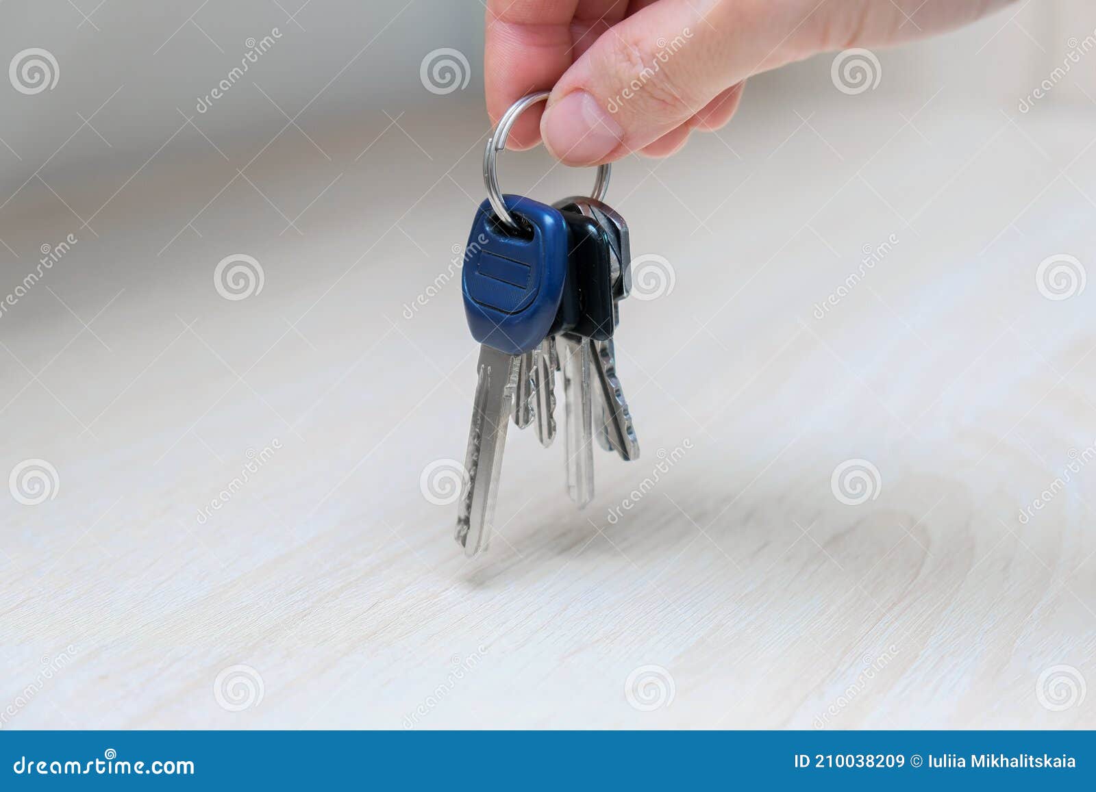 Hand Holding Up a Keys at Home, Leaving Home and Taking Keys from Table ...