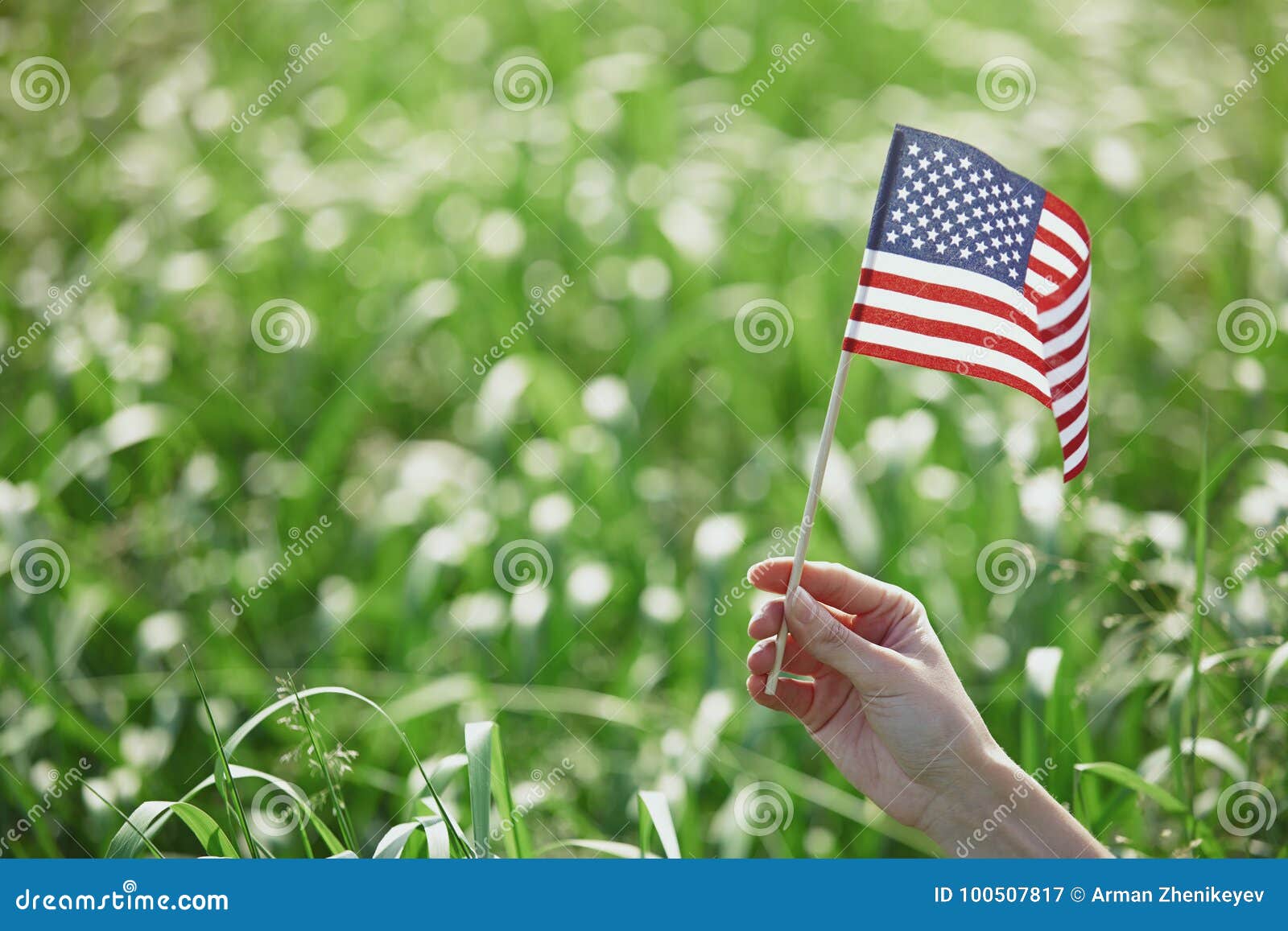 Hand Holding US Flag for Independence Day Stock Image - Image of hand ...