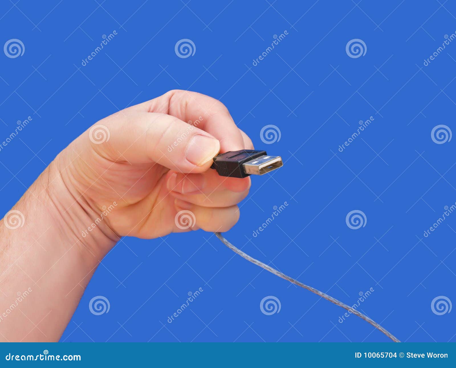 Hand Holding USB Cable 1-Blue Background Stock Photo - Image of plug ...