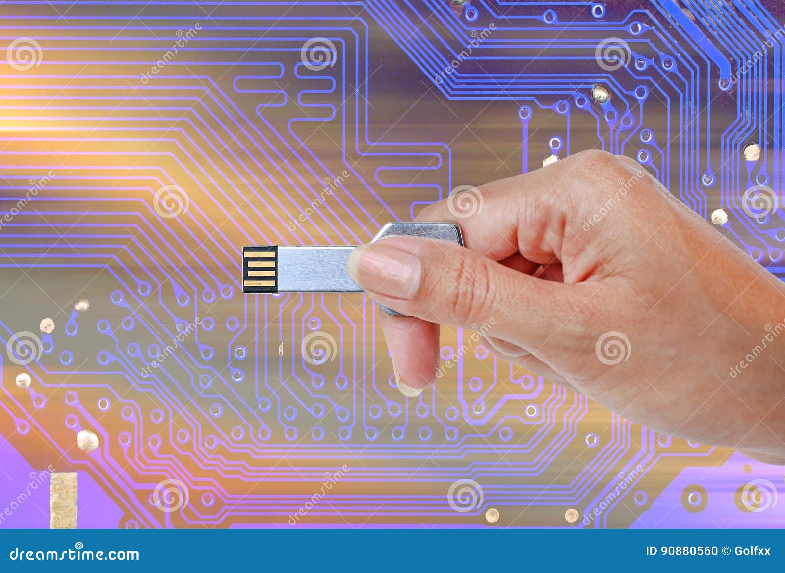 Hand Holding USB Data Storage Against Light and Circuit Stock Photo ...