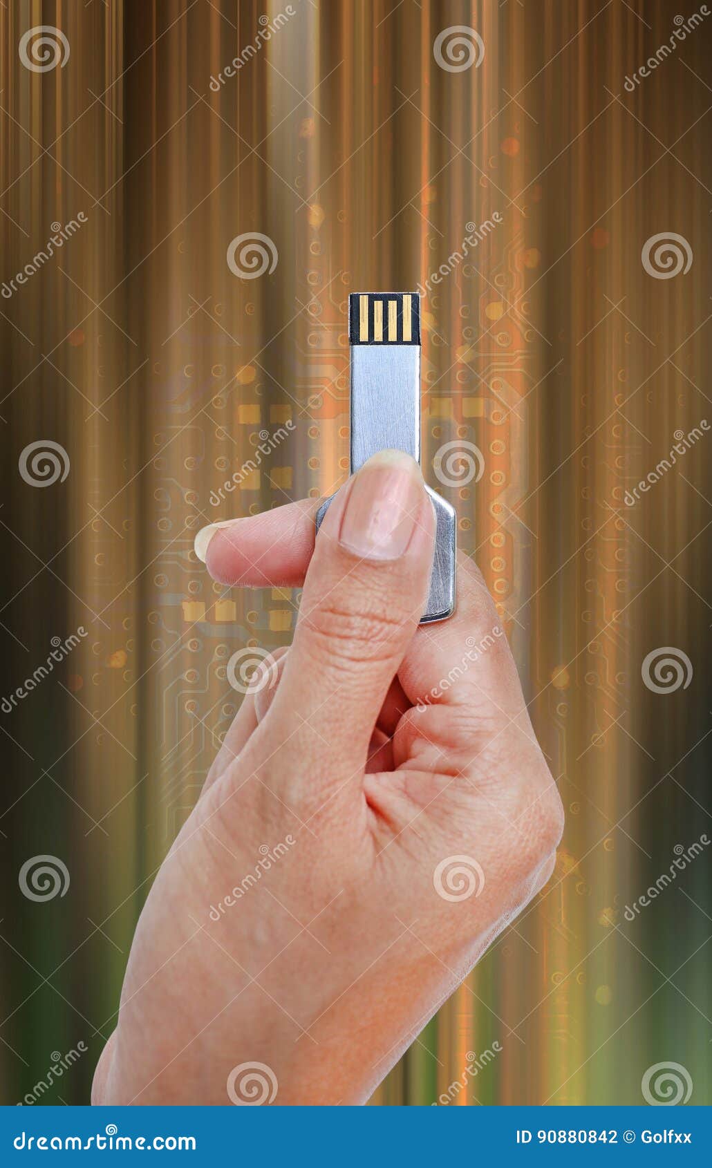 Hand Holding USB Data Storage Against Light and Circuit Stock Photo ...