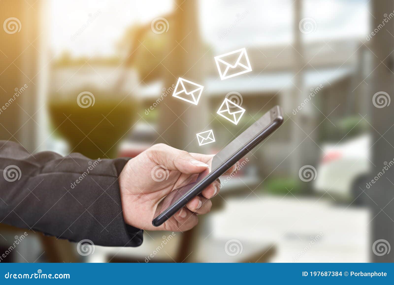 Hand Holding Using Mobile Phone with Email Icon on Screen. Stock Photo ...