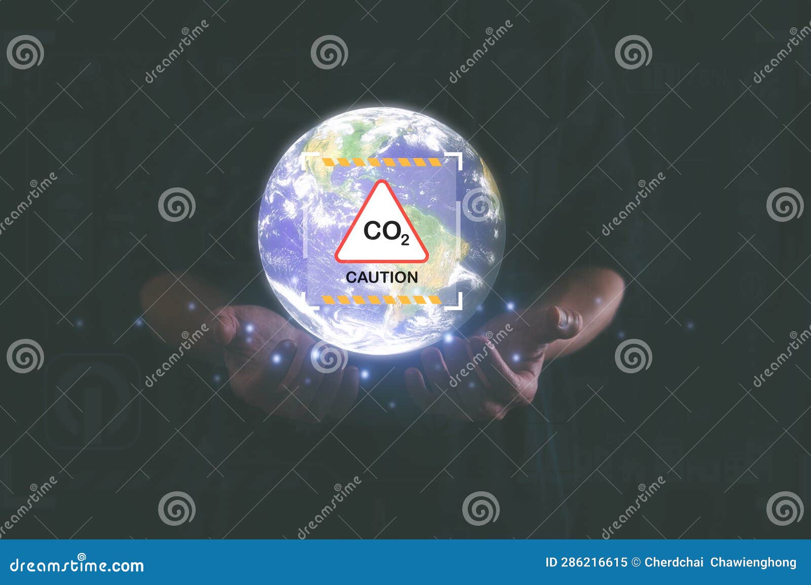 Hand Holding Virtual Glob and Caution Sign CO2 Reduce Icon Concept of Decrease Carbon Dioxide ...