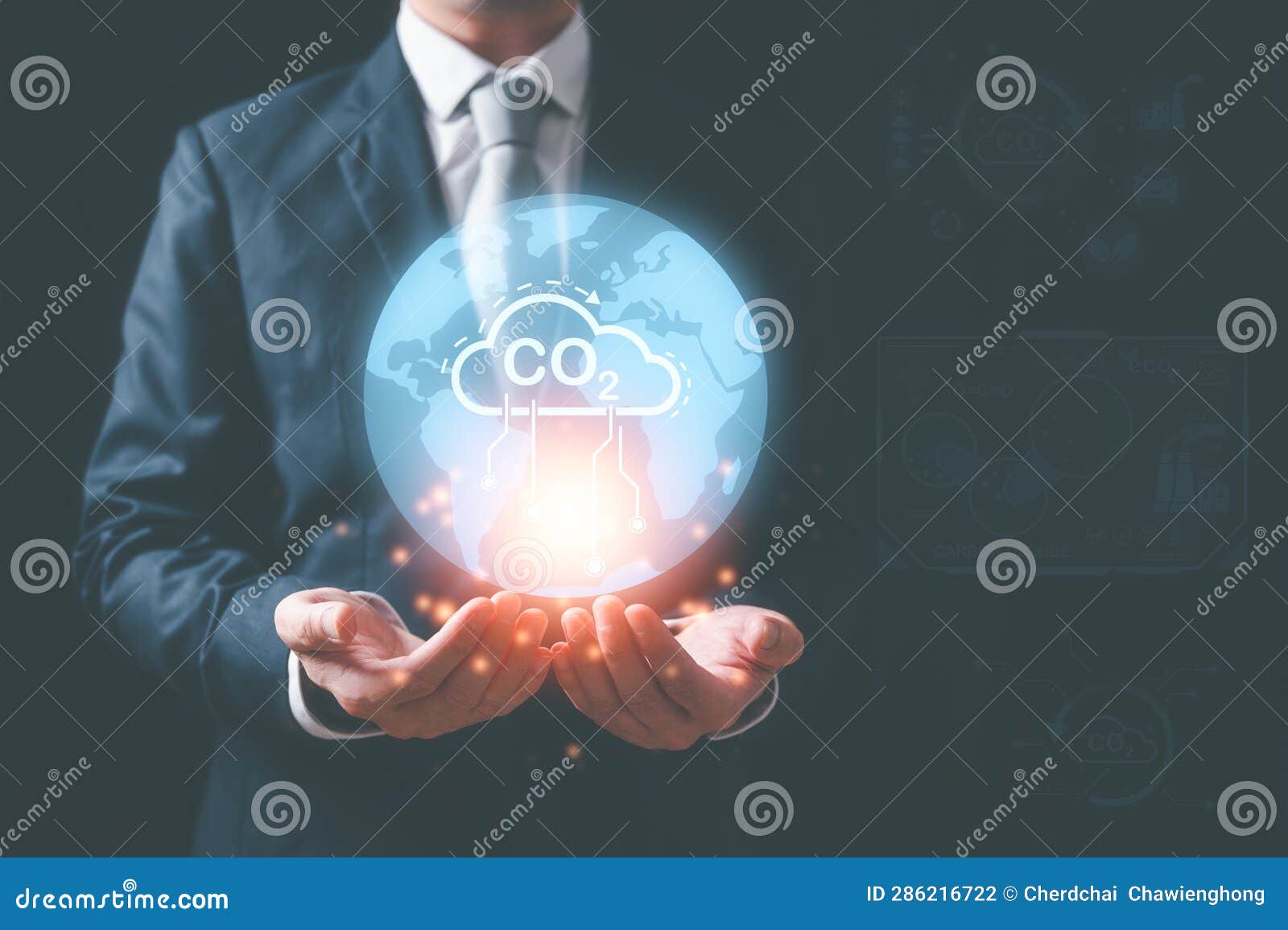 Hand Holding Virtual Glob and Sign CO2 Reducing Icon in Concept of Decrease Carbon Dioxide ...