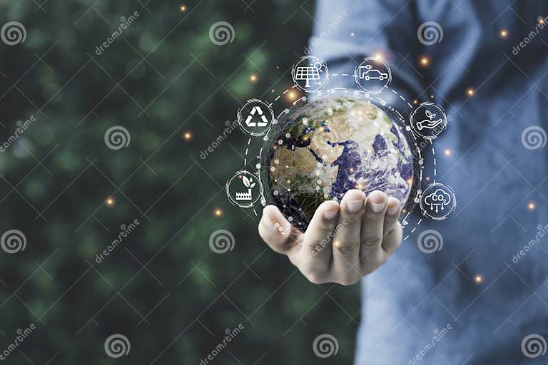 Hand Holding Virtual World with CO2 Reducing ,Recycle ,green Factory Icon on Nature for Decrease ...