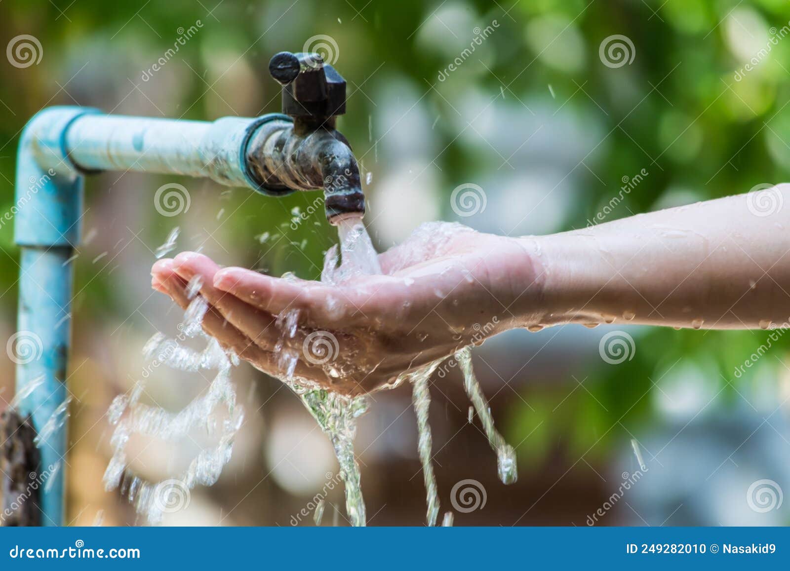 Hand Holding the Water Flow Stock Photo - Image of hold, fresh: 249282010