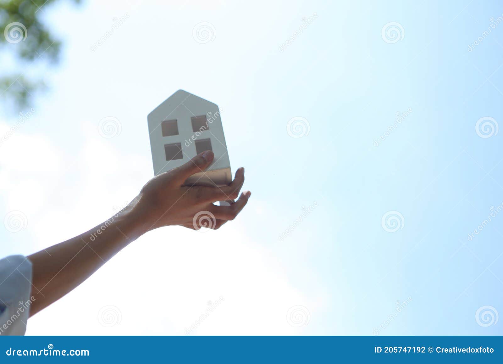 Hand Holding White House with Blue Sky Stock Photo - Image of mortgage ...