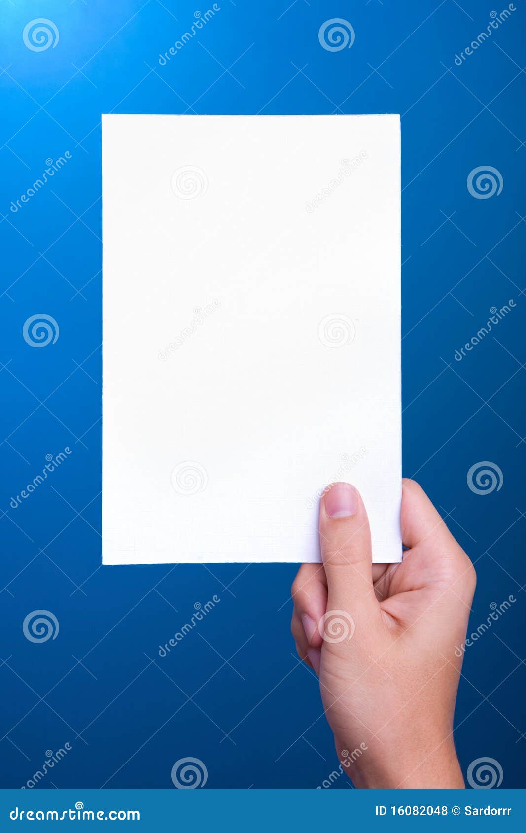 Hand Holding White Sheet Paper Card on Blue Stock Photo - Image of ...