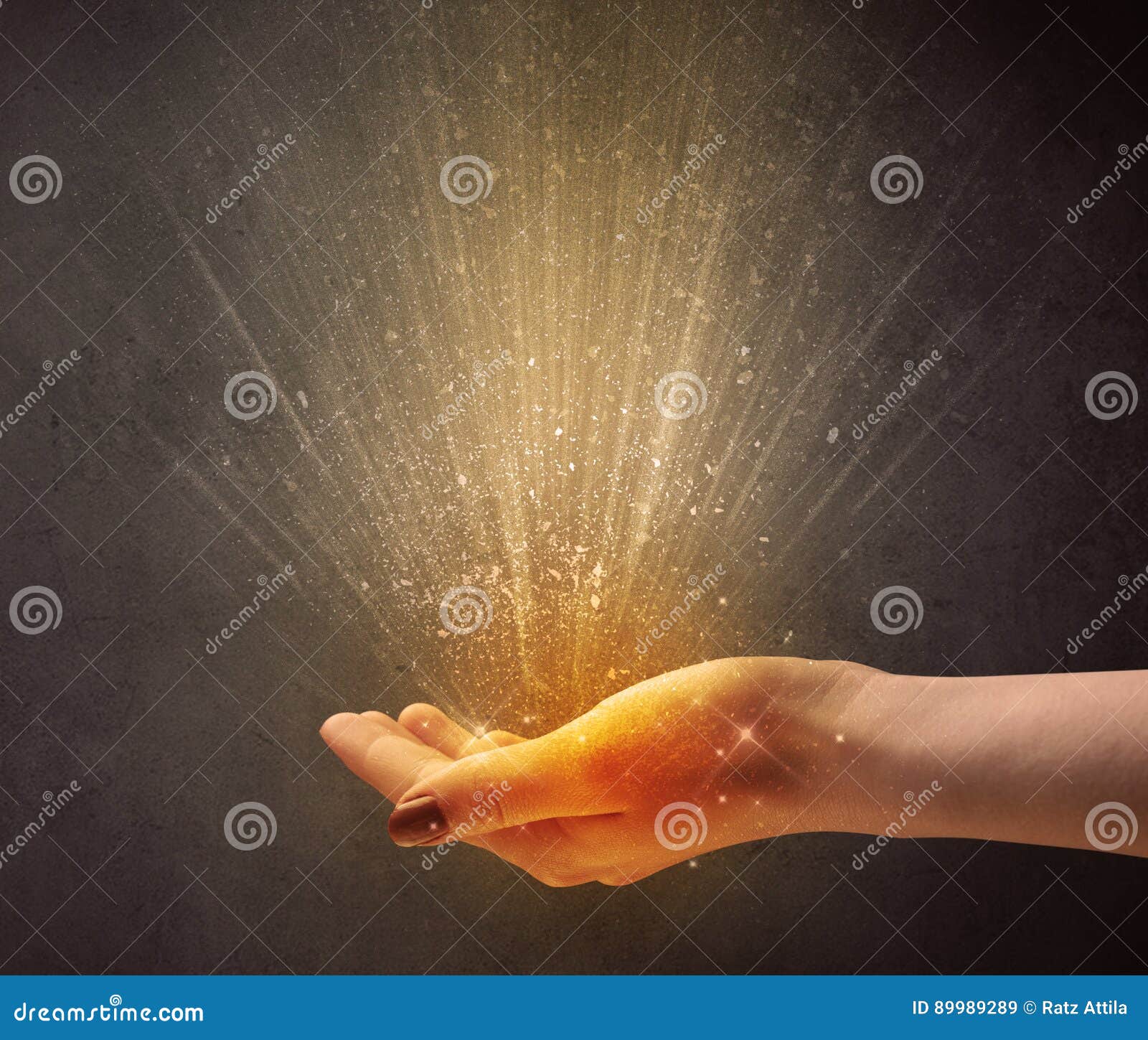 Hand holding yellow light stock image. Image of hands - 89989289
