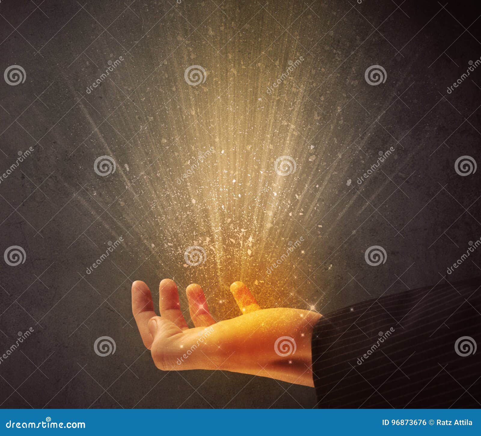 Hand holding yellow light stock photo. Image of glowing - 96873676