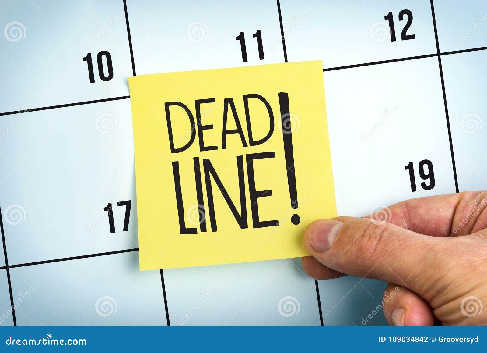Hand Holding Yellow Paper Note with Words Deadline Stock Photo - Image ...