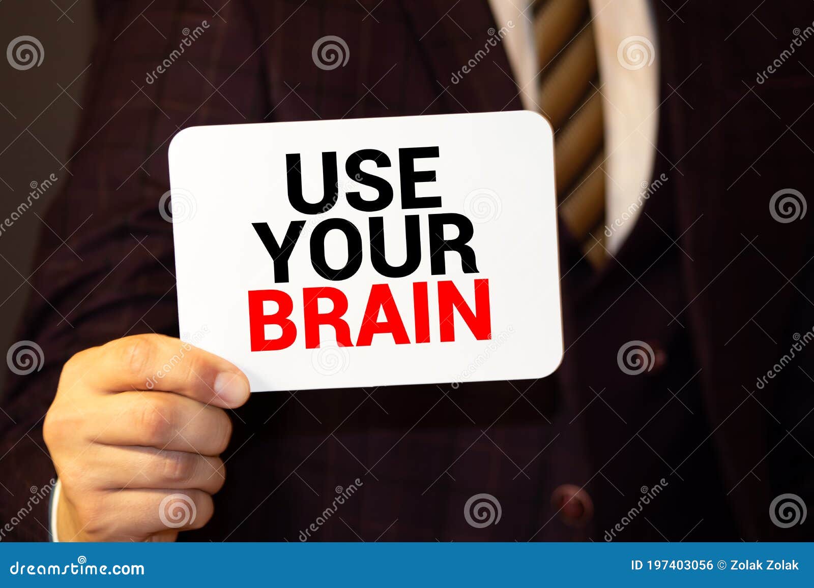 Hand Holding Yellow Sticky Note Written USE YOUR BRAIN Word Stock Photo ...