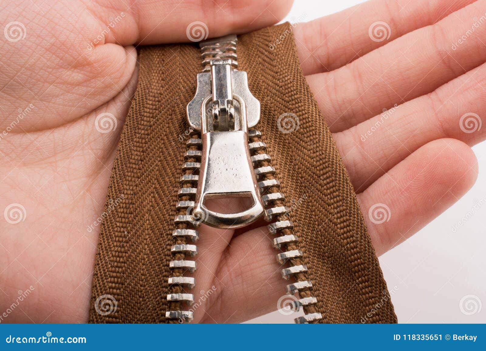 Hand holding zipper stock image. Image of material, clothing - 118335651