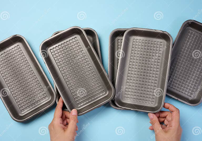 Hand Holds Black Disposable Polystyrene Foam Rectangular Plate for ...
