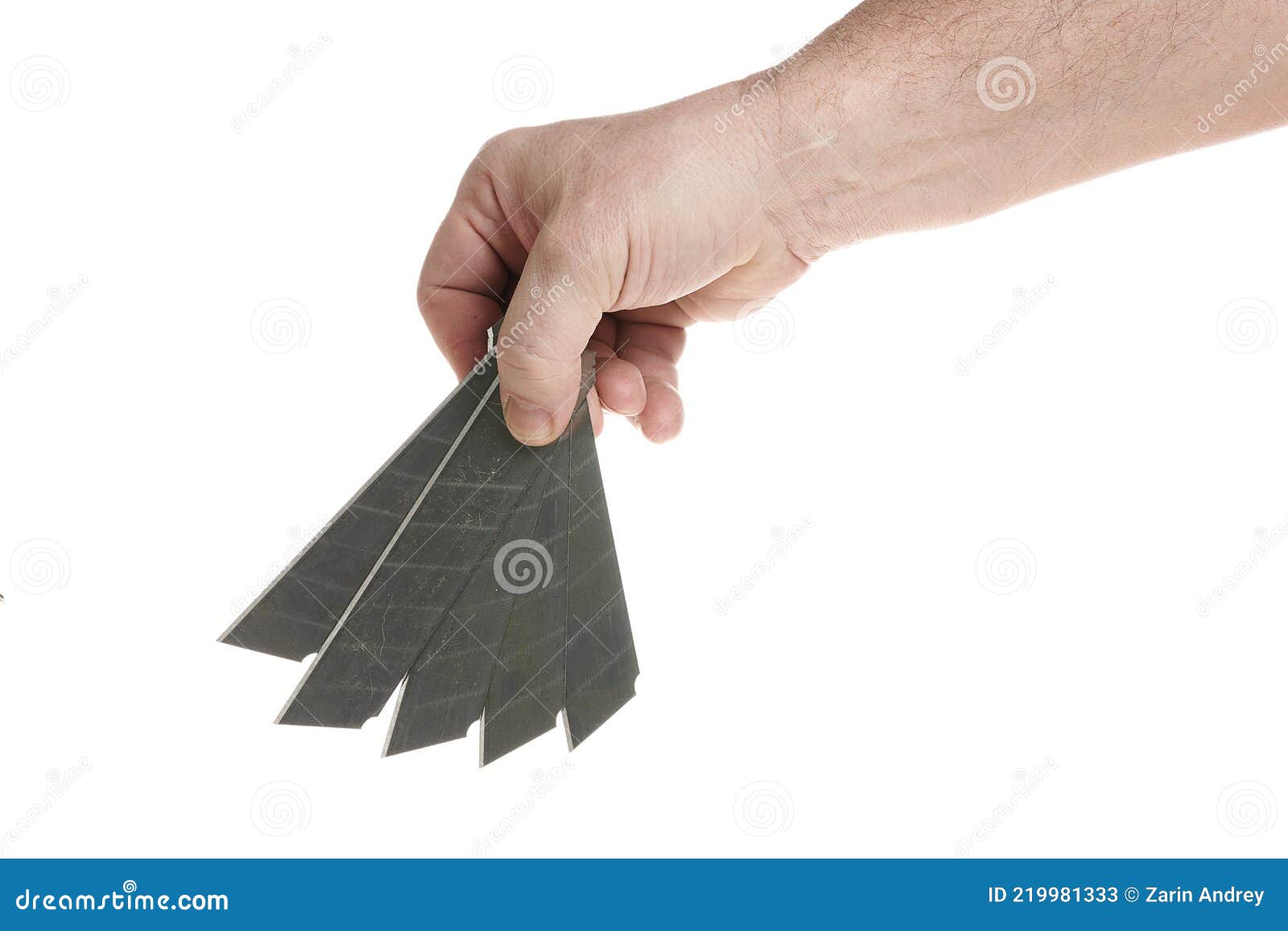 Hand Holds a Blade for a Construction Knife on a White Background Stock ...