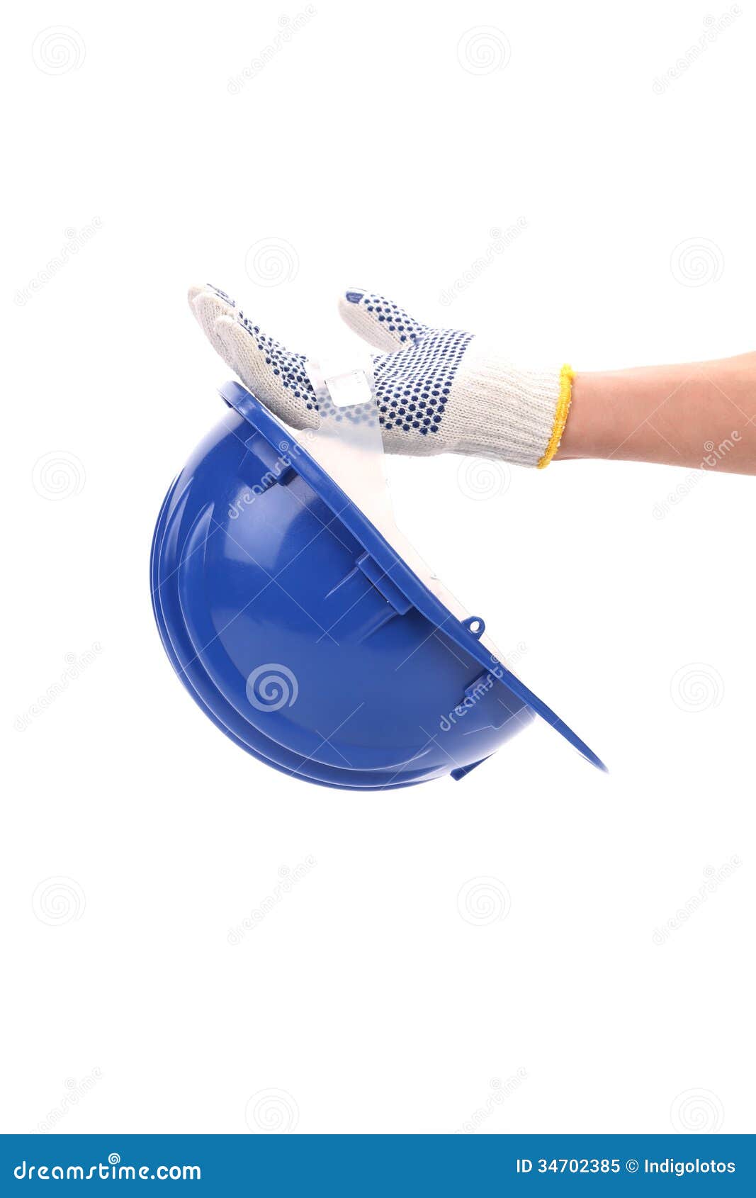 Hand holds blue hard hat. stock image. Image of hard - 34702385