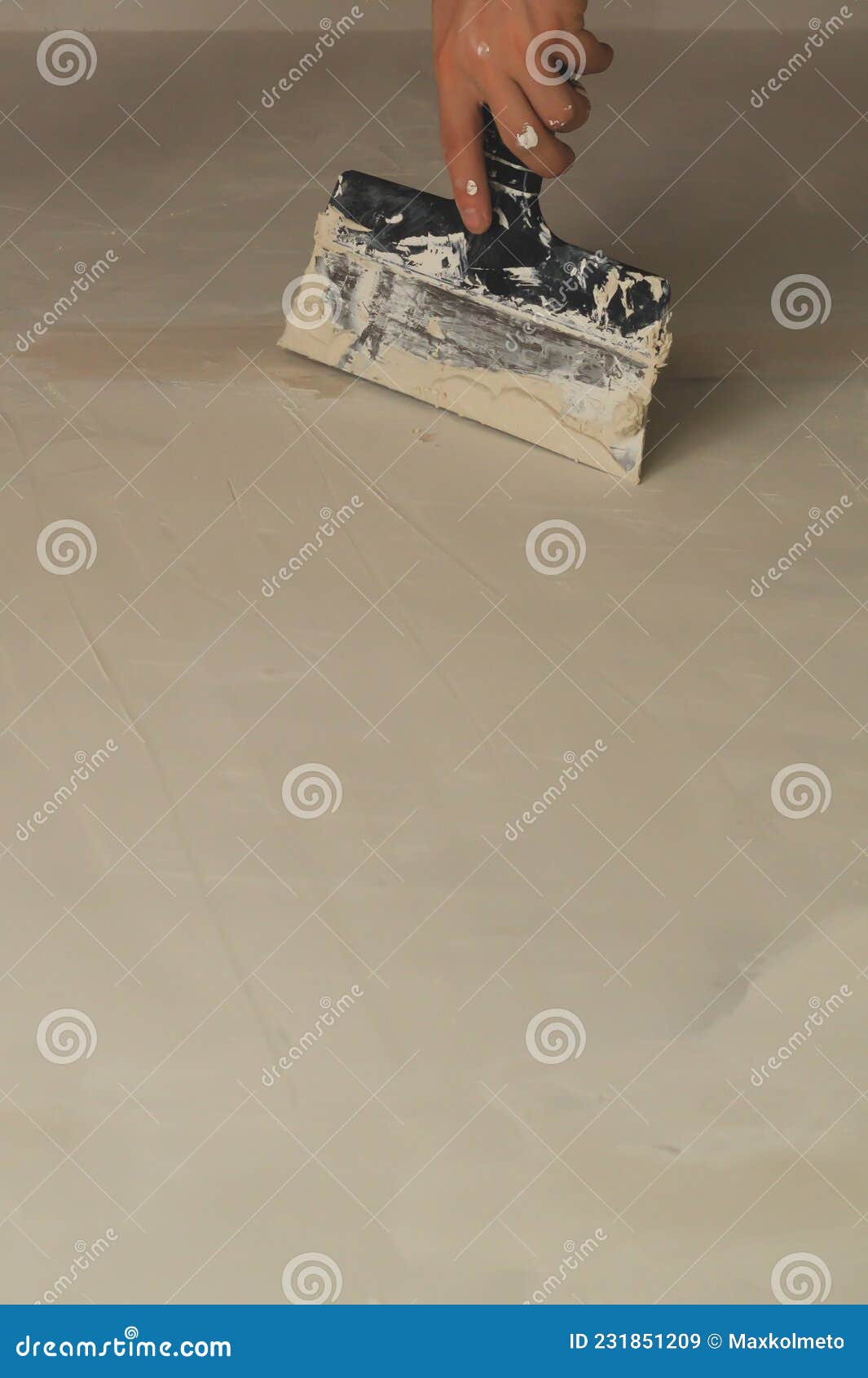 Hand Holds Construction Spatula with Putty. Trowel with Spackling ...