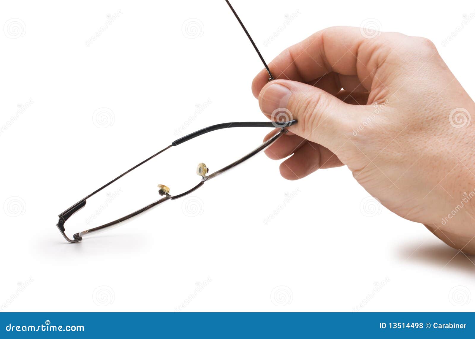 Hand holds glasses stock photo. Image of isolated, lens - 13514498