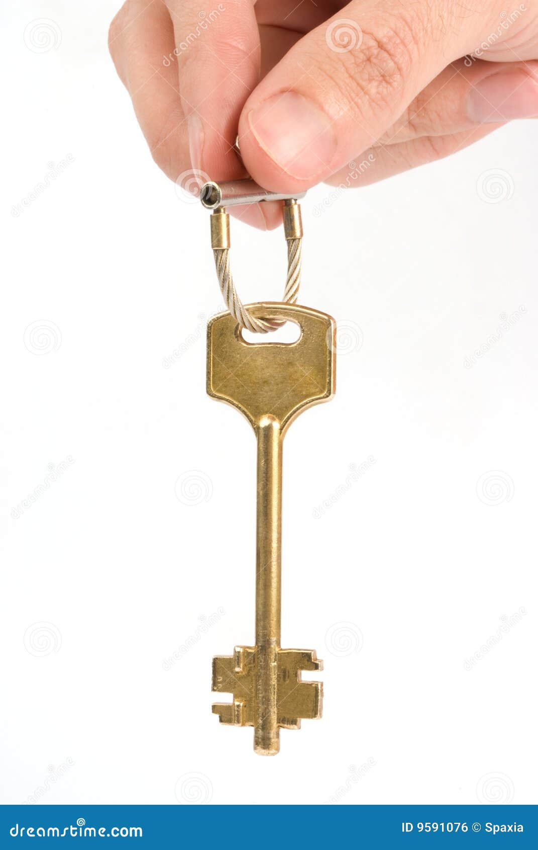 Hand holds a gold key stock photo. Image of metal, closing - 9591076
