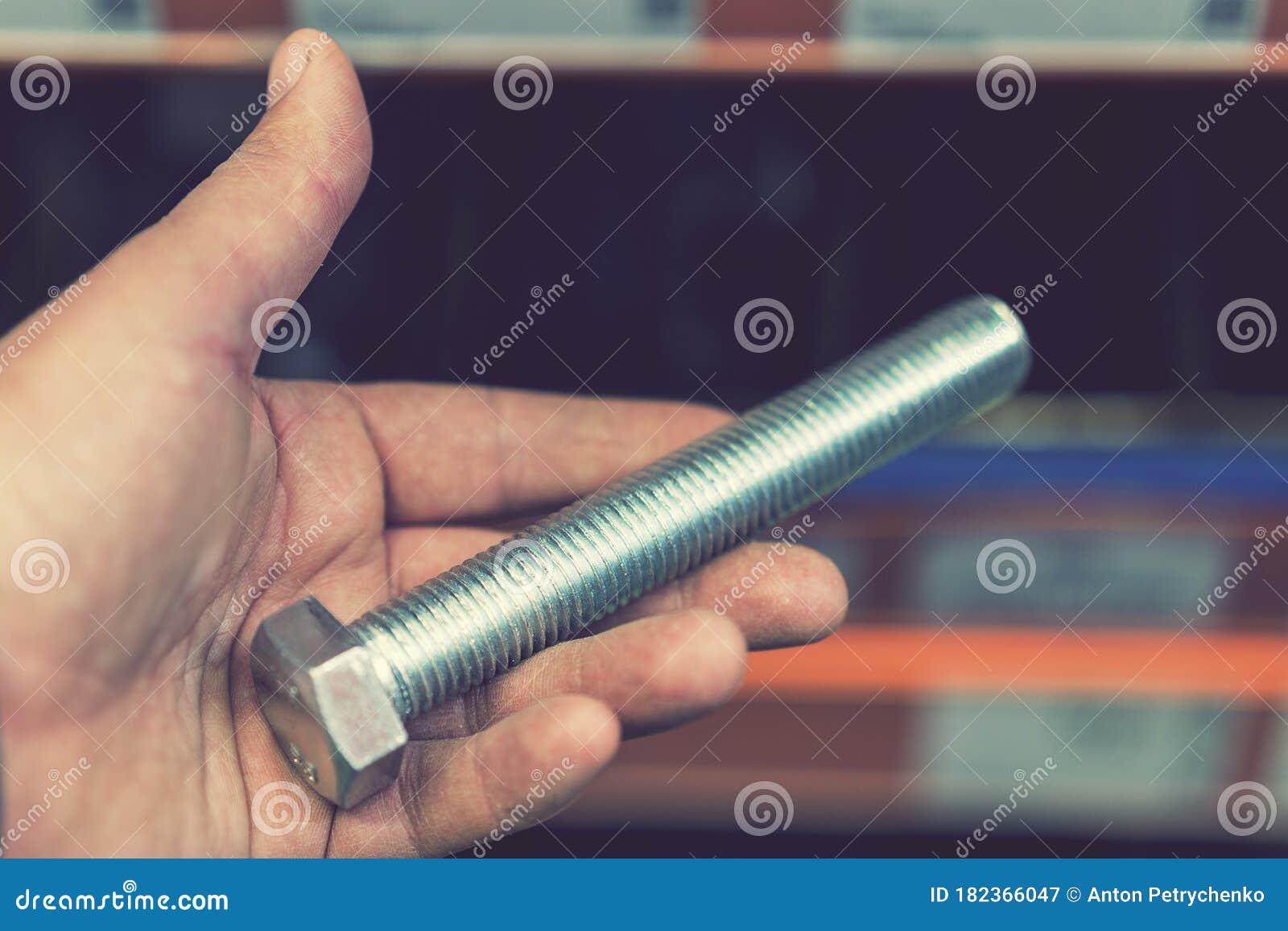 Hand Holds an Iron Bolt. Repair Concept Stock Image - Image of metal ...