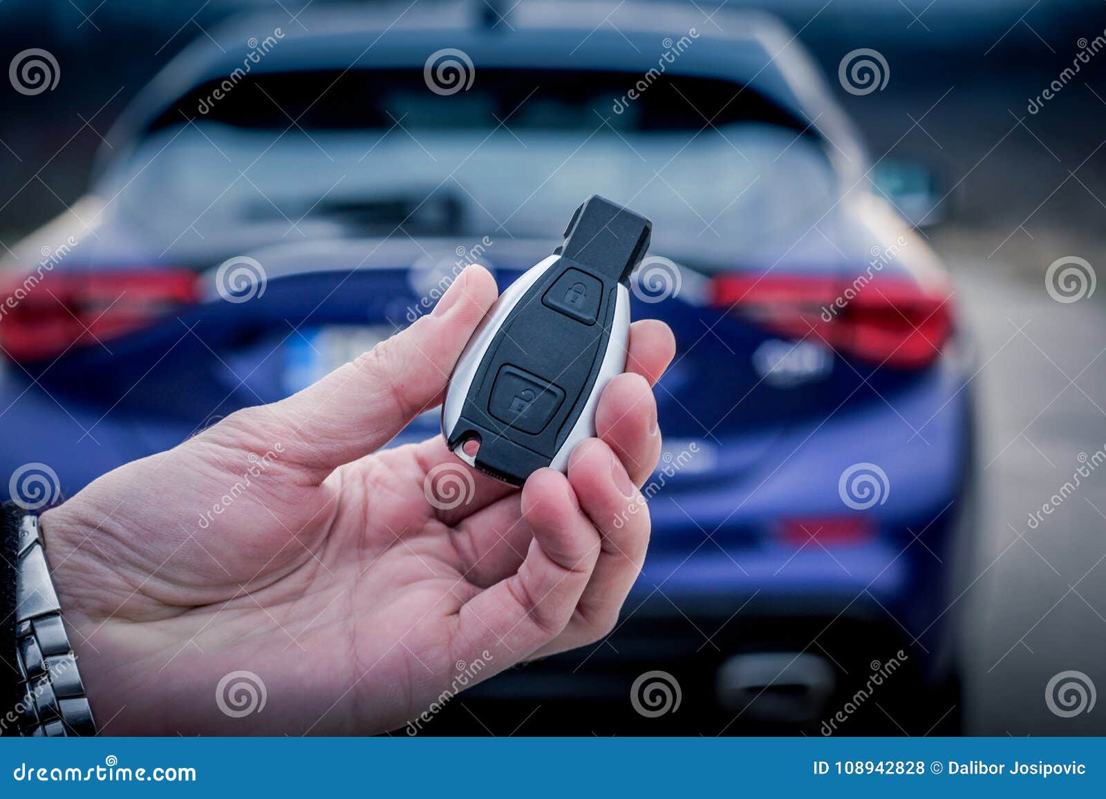 Hand holding a car key stock photo. Image of vehicle - 108942828