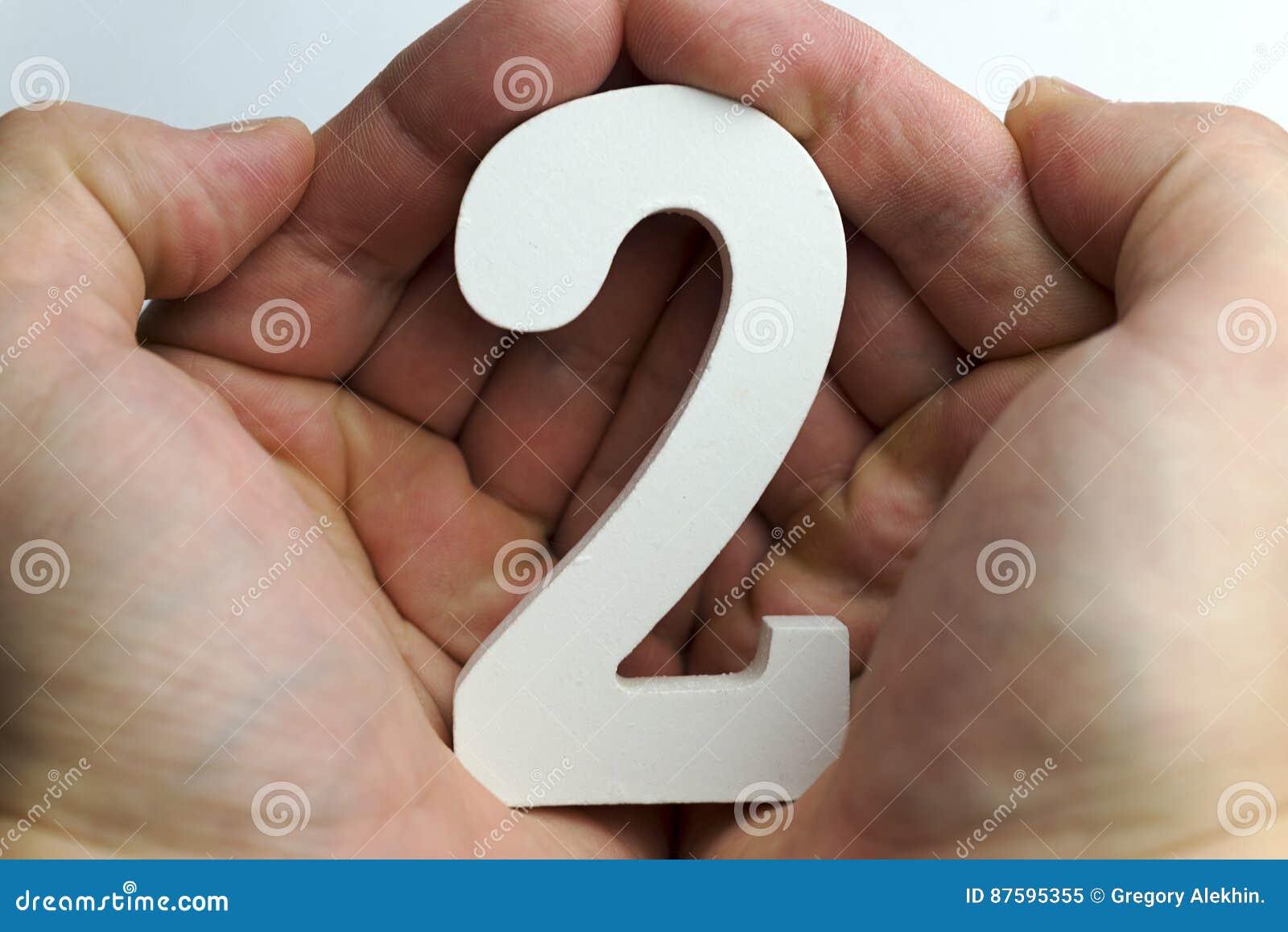 Hand holds the number two. stock image. Image of creativity - 87595355