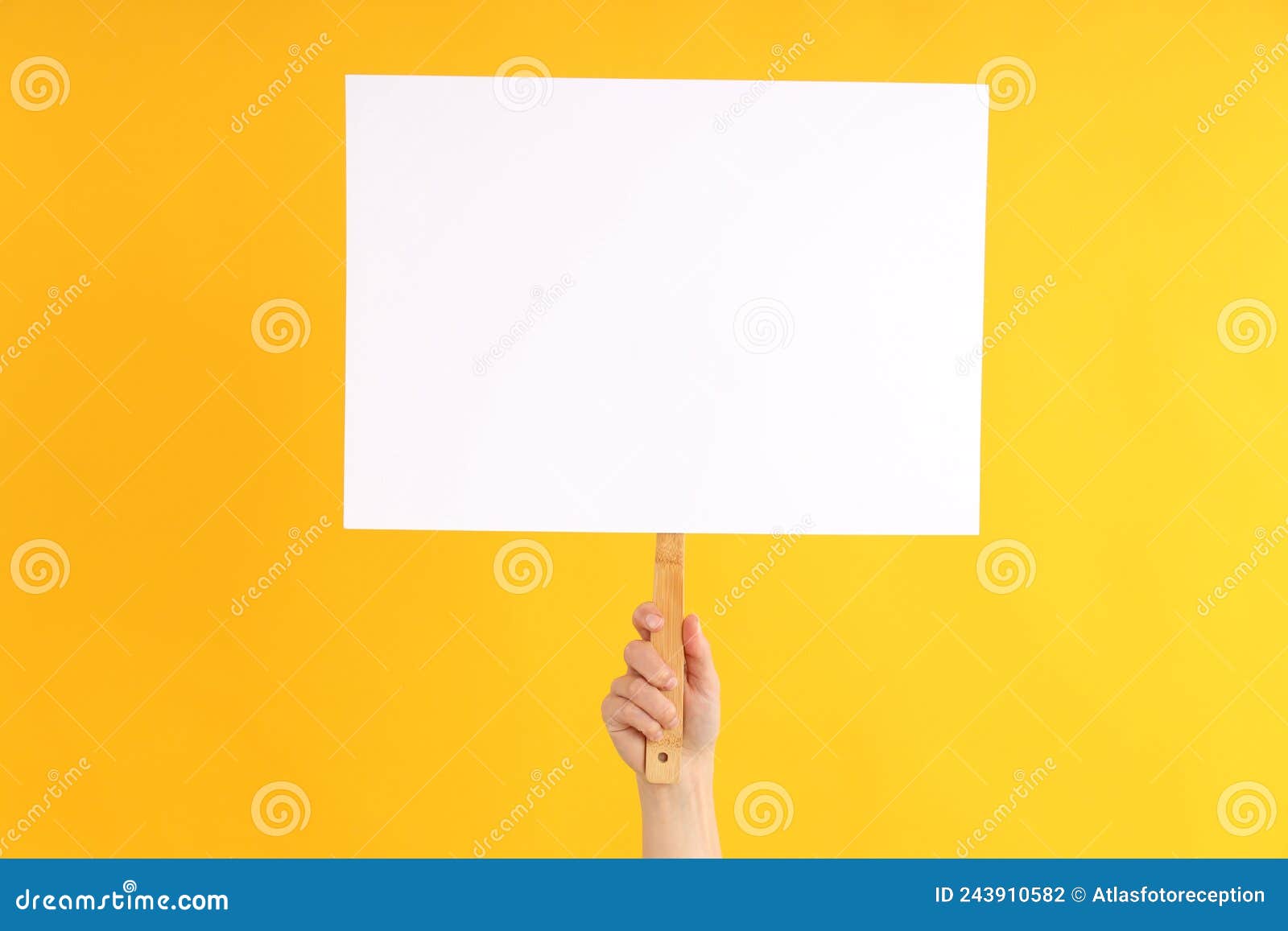 Hand Holds Protest Sign on Yellow Background Stock Photo - Image of ...