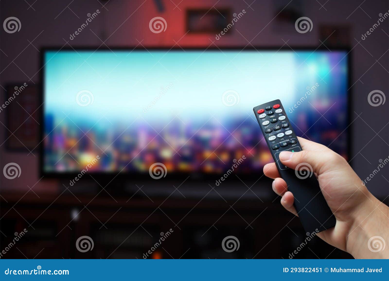 Hand Holds a Remote, Altering Channels on an Empty TV Screen Stock ...
