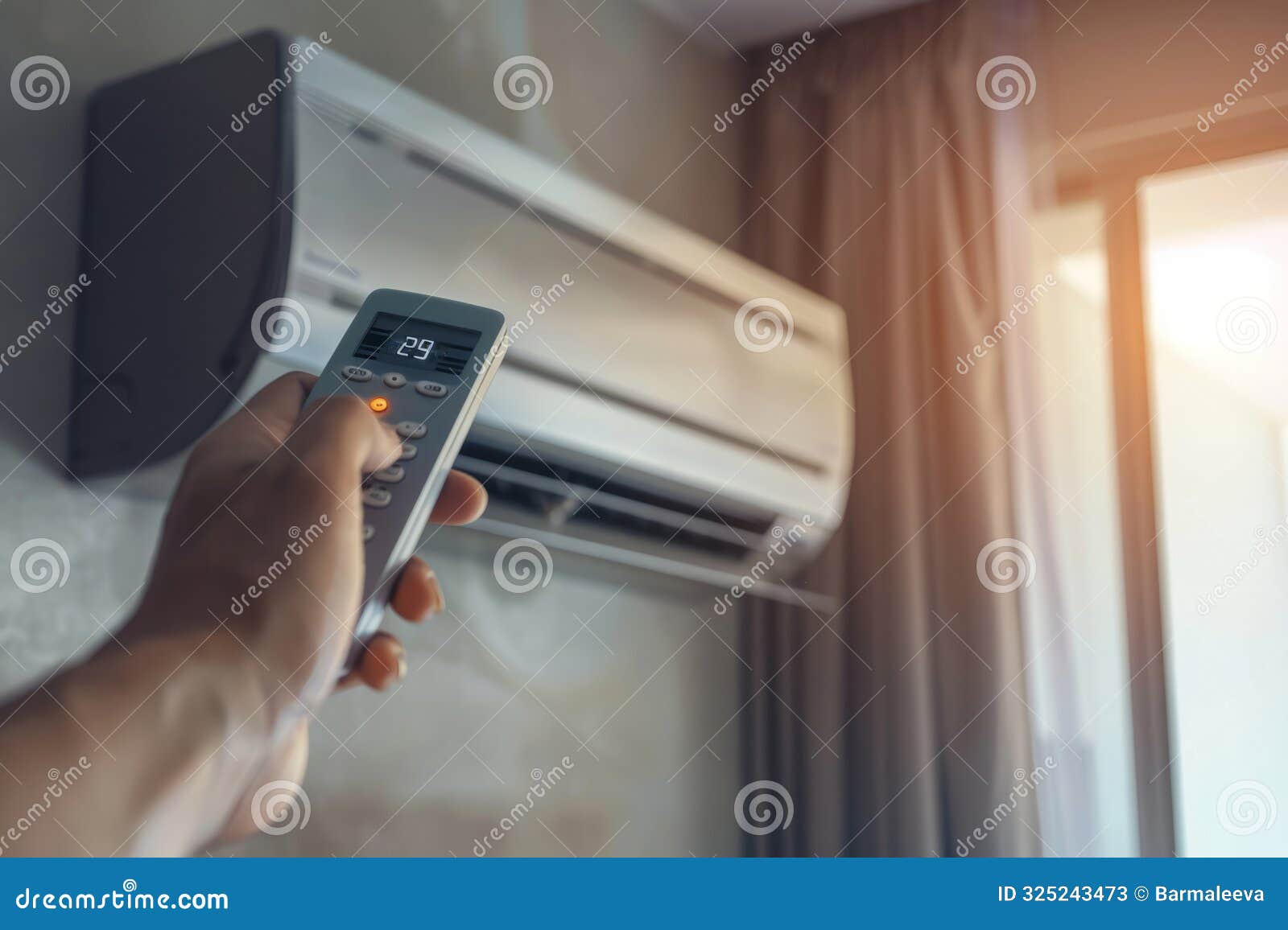 Hand Holds a Remote Control, Adjusting the Temperature of Air ...