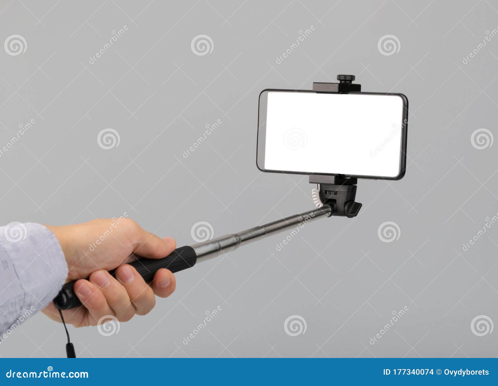 Hand Holds Selfie Stick with Phone with Screen Stock Photo - Image of ...