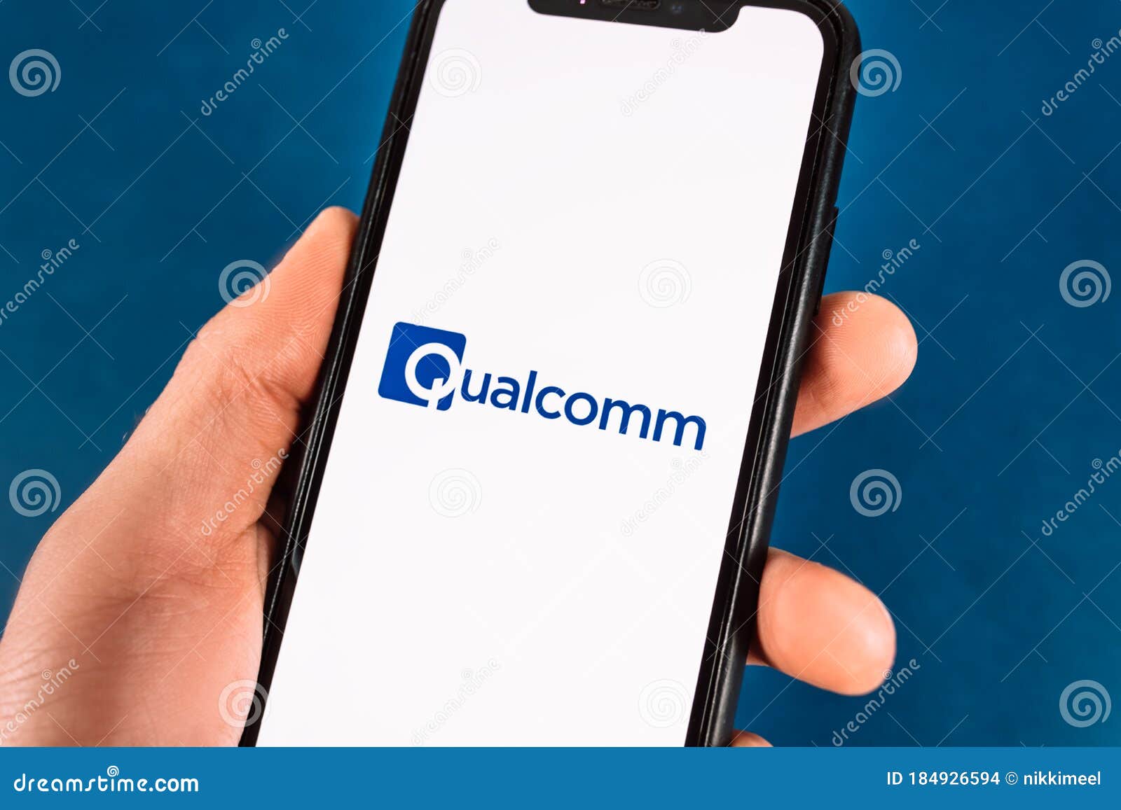 Hand Holds Smartphone with Qualcomm Logo. Editorial Stock Image - Image ...