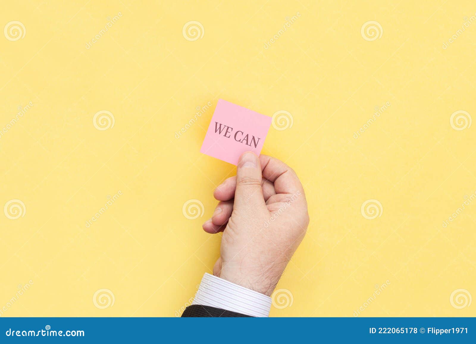 The Hand Holds a Sticky Note with Inscription we Can Stock Photo ...