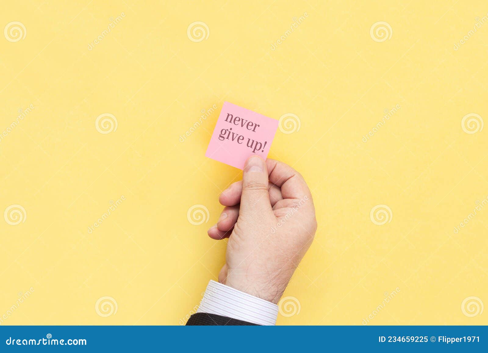The Hand Holds a Sticky Note with Inscription Never Give Up Stock Image ...