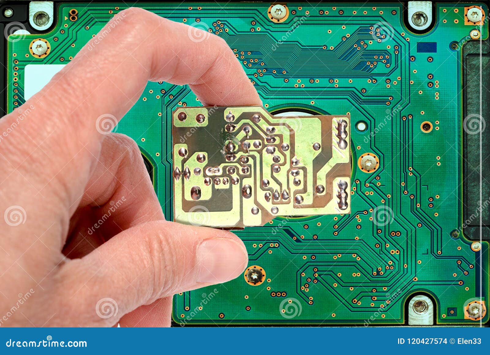 Hand holds a techno key stock photo. Image of board - 120427574