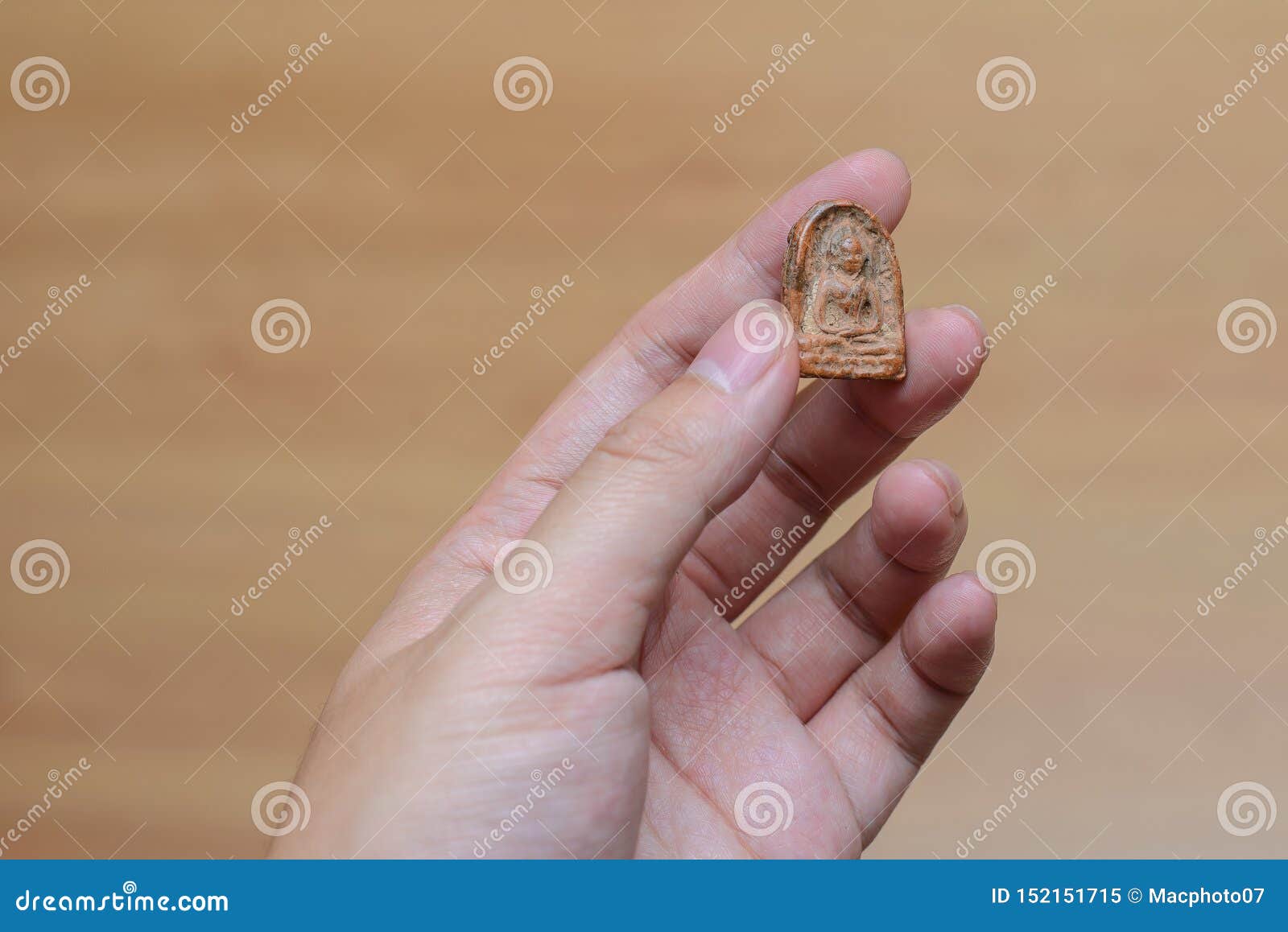 Hand Holds Thai Amulet Isolated on Background Stock Image - Image of ...
