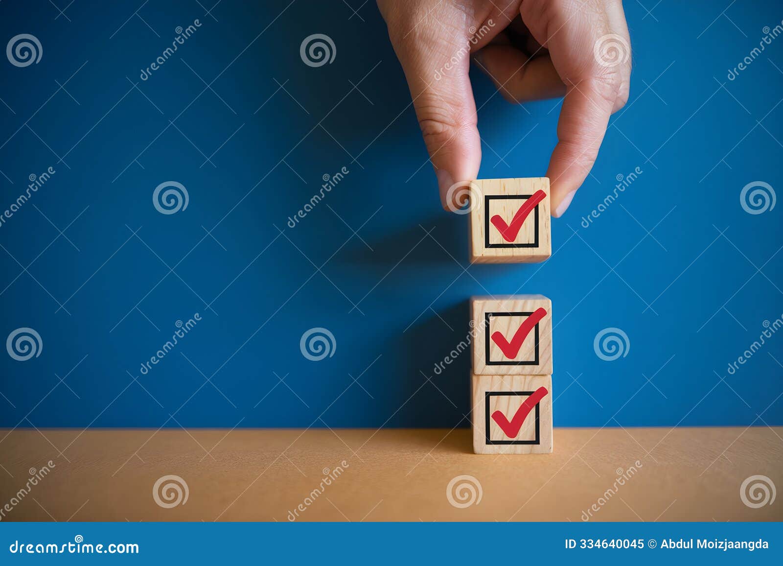 Hand Holds a Wooden Block with a Red Checkmark on a Blue Background ...