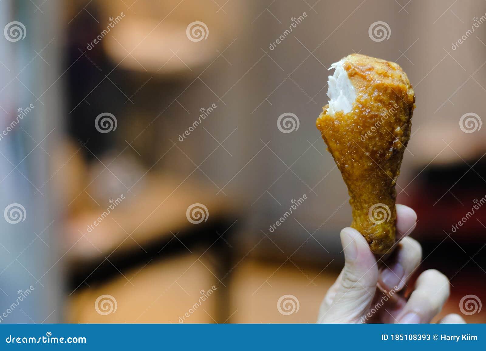 Hand of Human Holding Crispy Fried Chicken in the Kitchen Stock Image ...