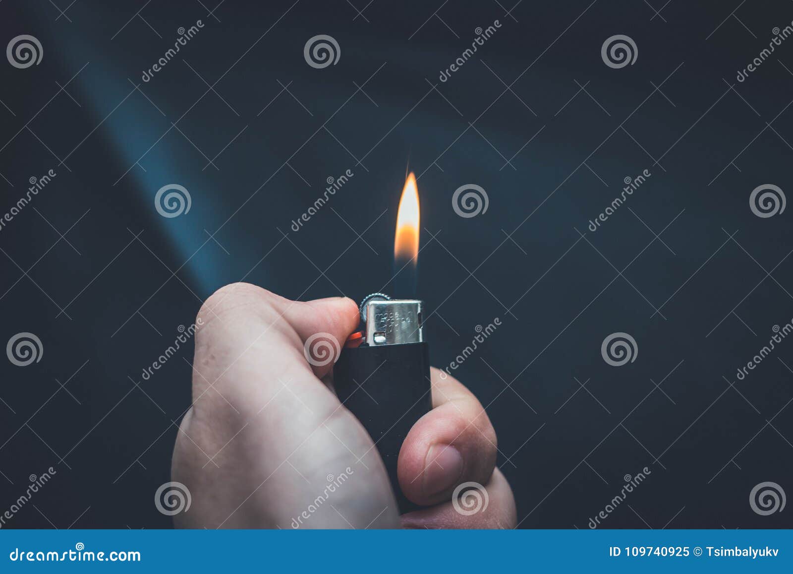 Hand Igniting Fire Lighters on a Black Stock Image - Image of fire ...