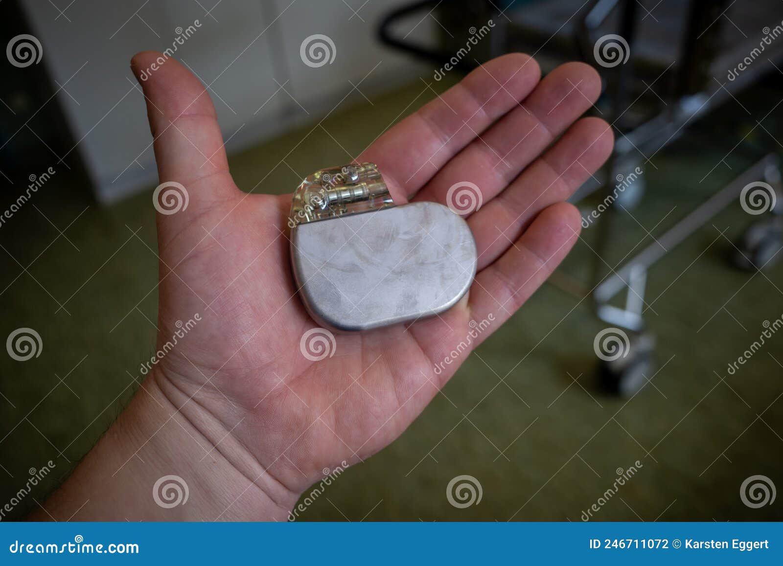 In a Hand is an Implantable Defibrilator Stock Photo - Image of badge ...
