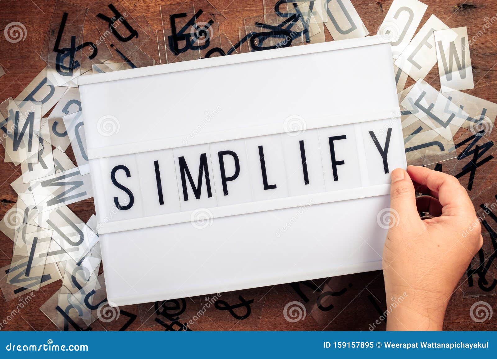 Simplify Word on Lightbox stock image. Image of ease - 159157895